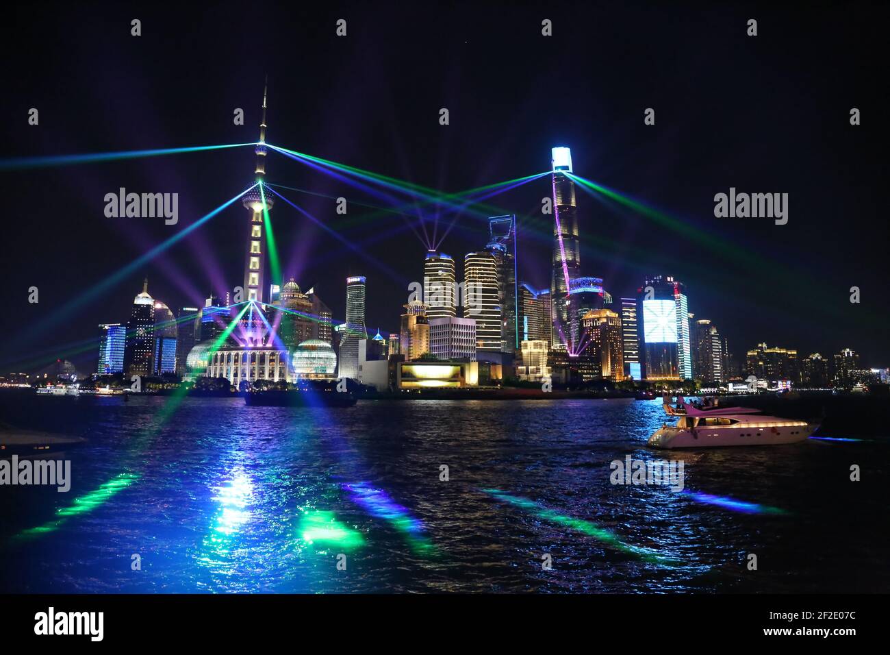 SHANGHAI, CHINA - OCTOBER 7, 2020 - People enjoy a light show at night ...