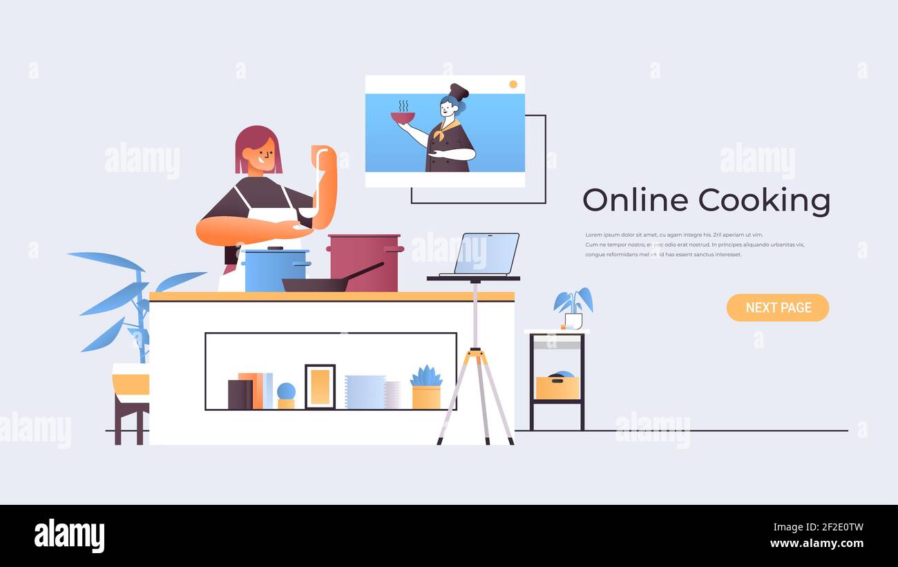 woman food blogger preparing dish and watching video tutorial with ...