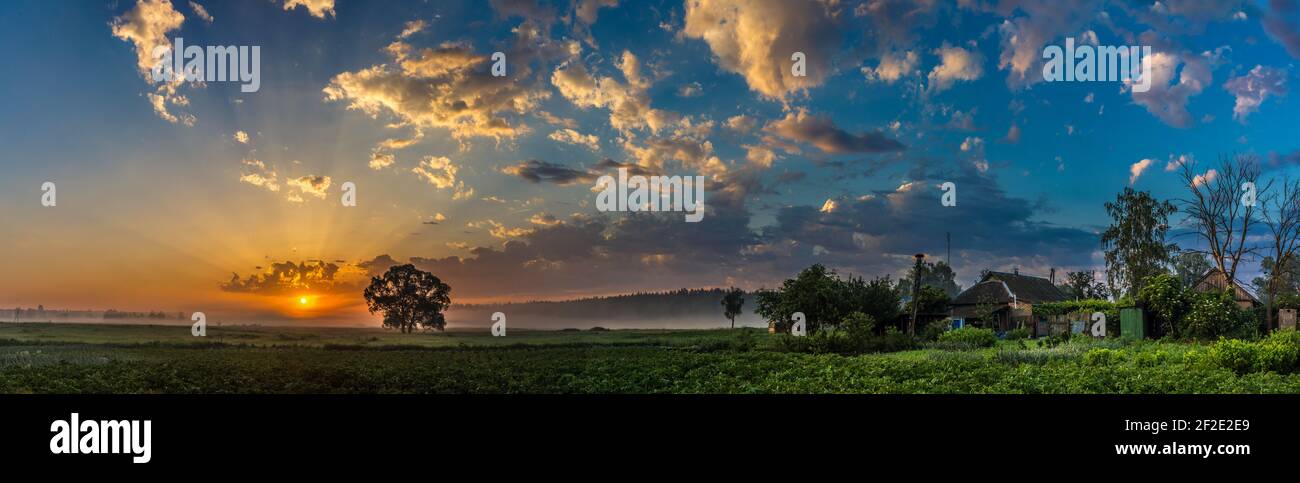Morning countryside landscape. Beautiful sunrise over garden in a ...