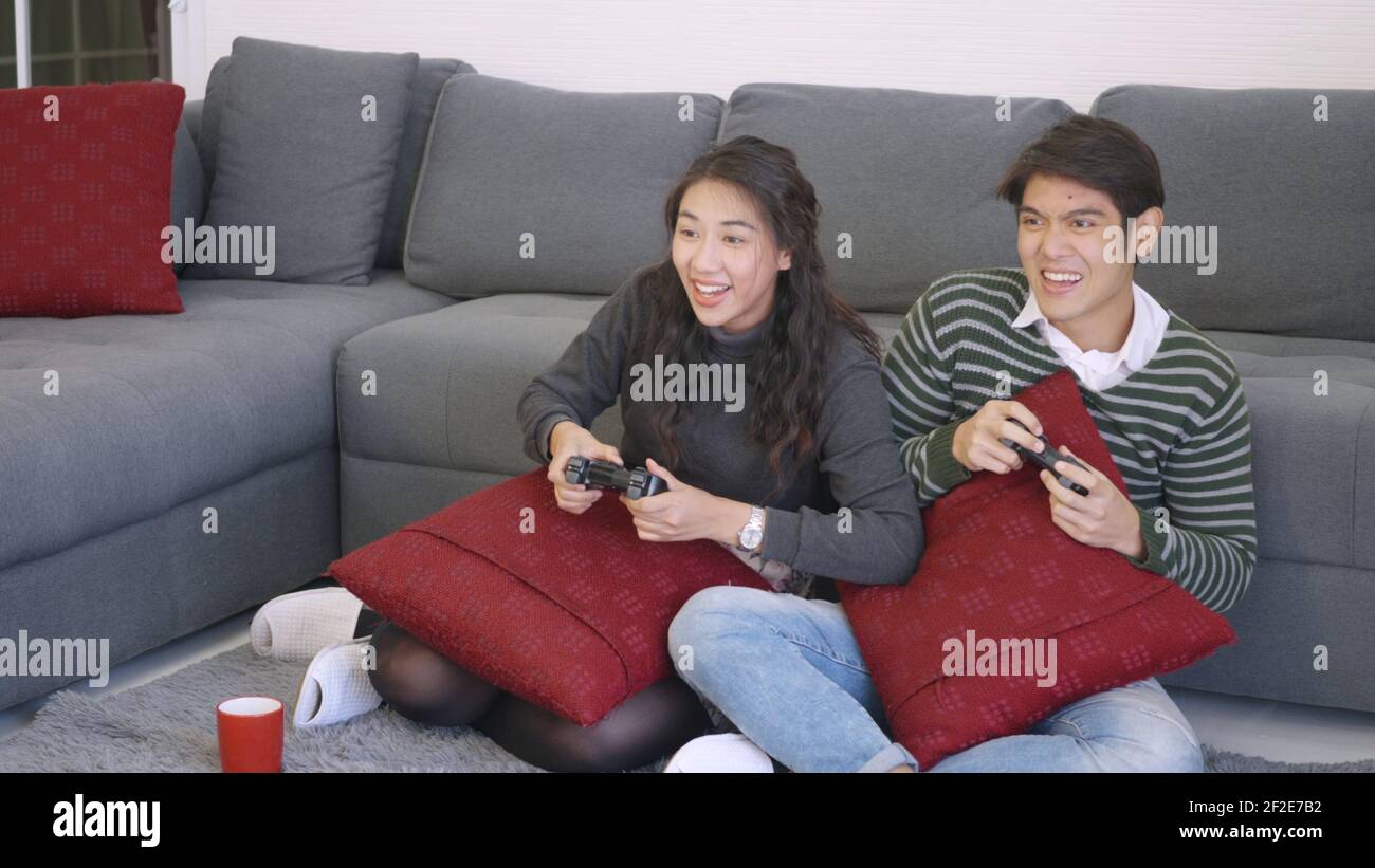 Happy Asian beautiful young family couple husband and wife smile and ...