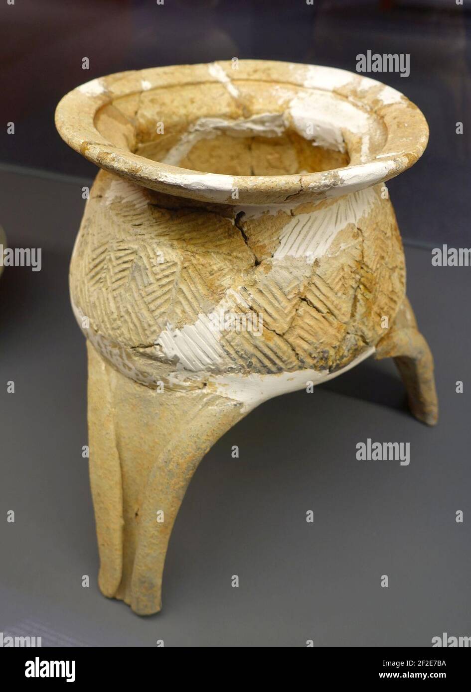 Pottery ding tripod vessel with zigzag pattern, Late Neolithic period ...