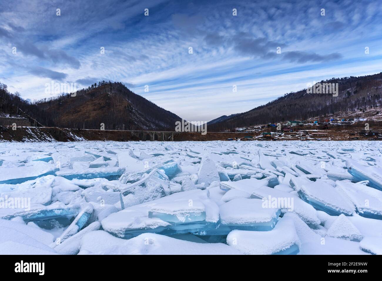 Lake Baikal in Siberia with a pile of beautiful ice hummocks near the ...