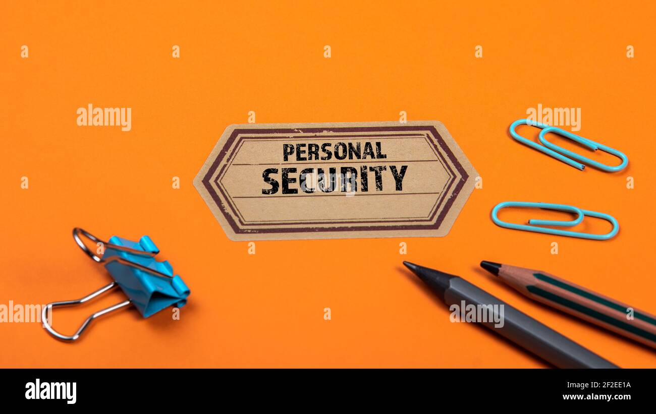 PERSONAL SECURITY. Orange notes and documents folder. Office supplies ...