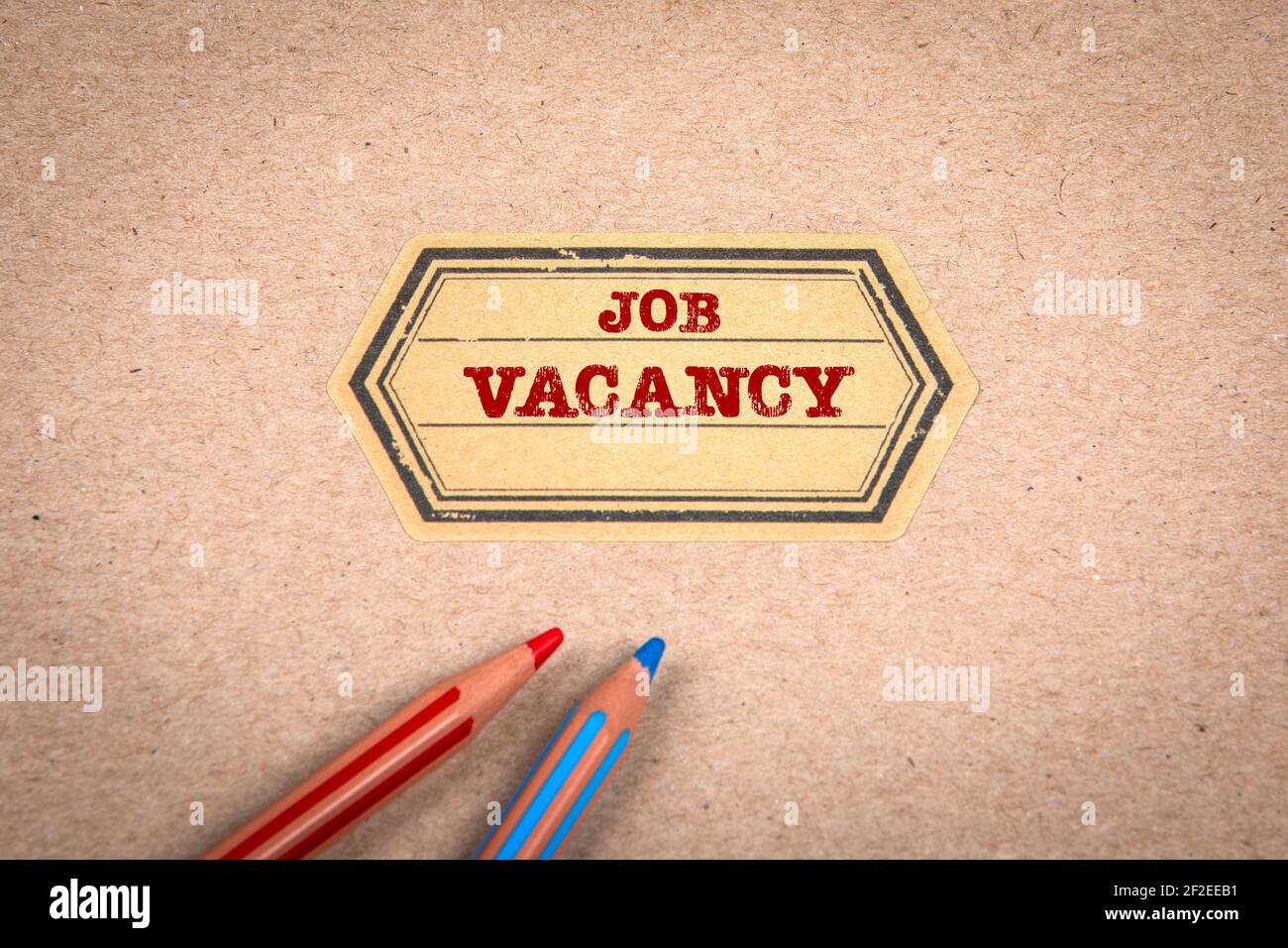 Job Vacancy. Cardboard notebook cover and colored pencils Stock Photo ...
