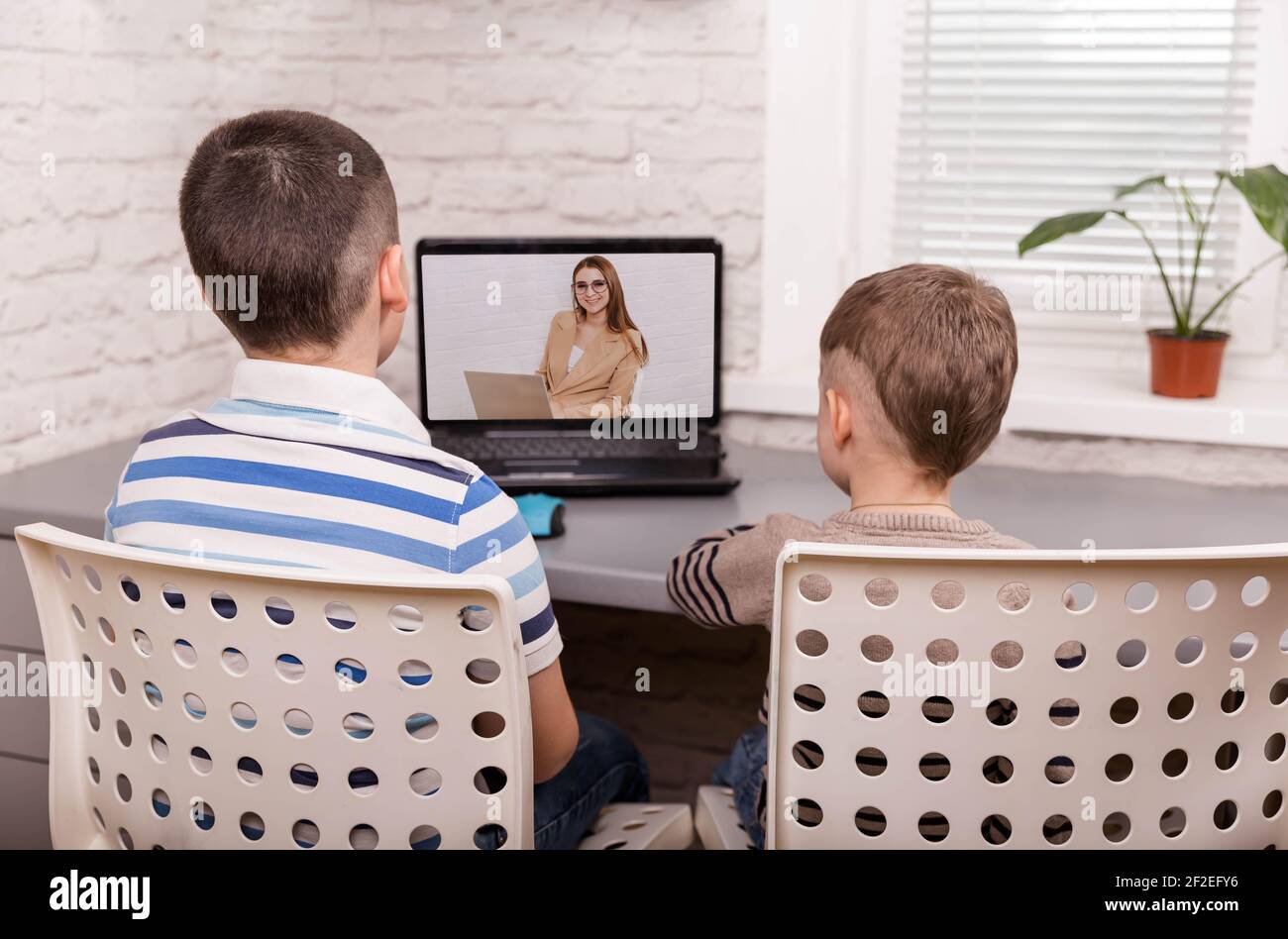 Kids attending online class hi-res stock photography and images - Alamy