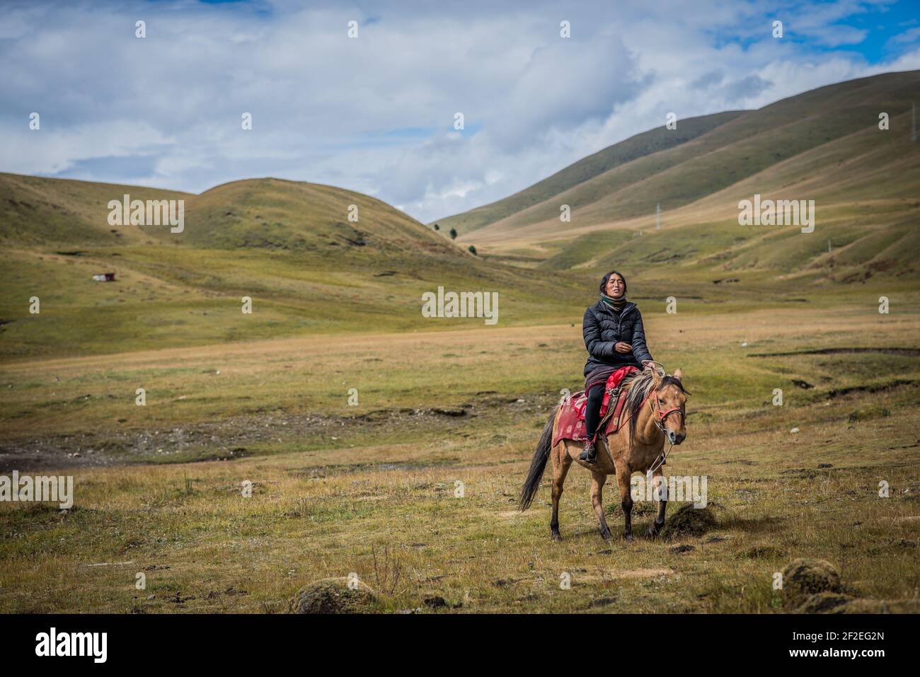 Farmer riding a horse hi-res stock photography and images - Alamy