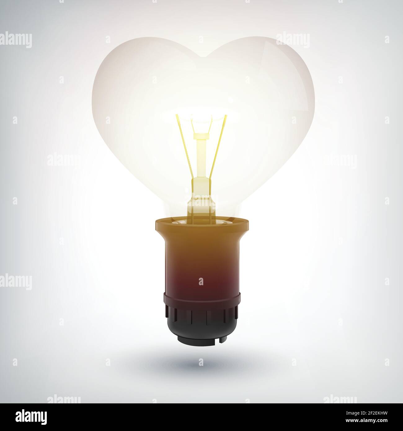 Glowing lightbulb with plastic base concept in shape of heart as symbol ...