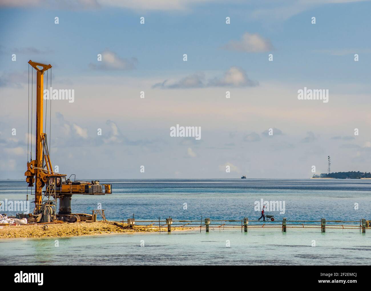 Construction machine on the Maldives island in the Indian ocean Stock ...