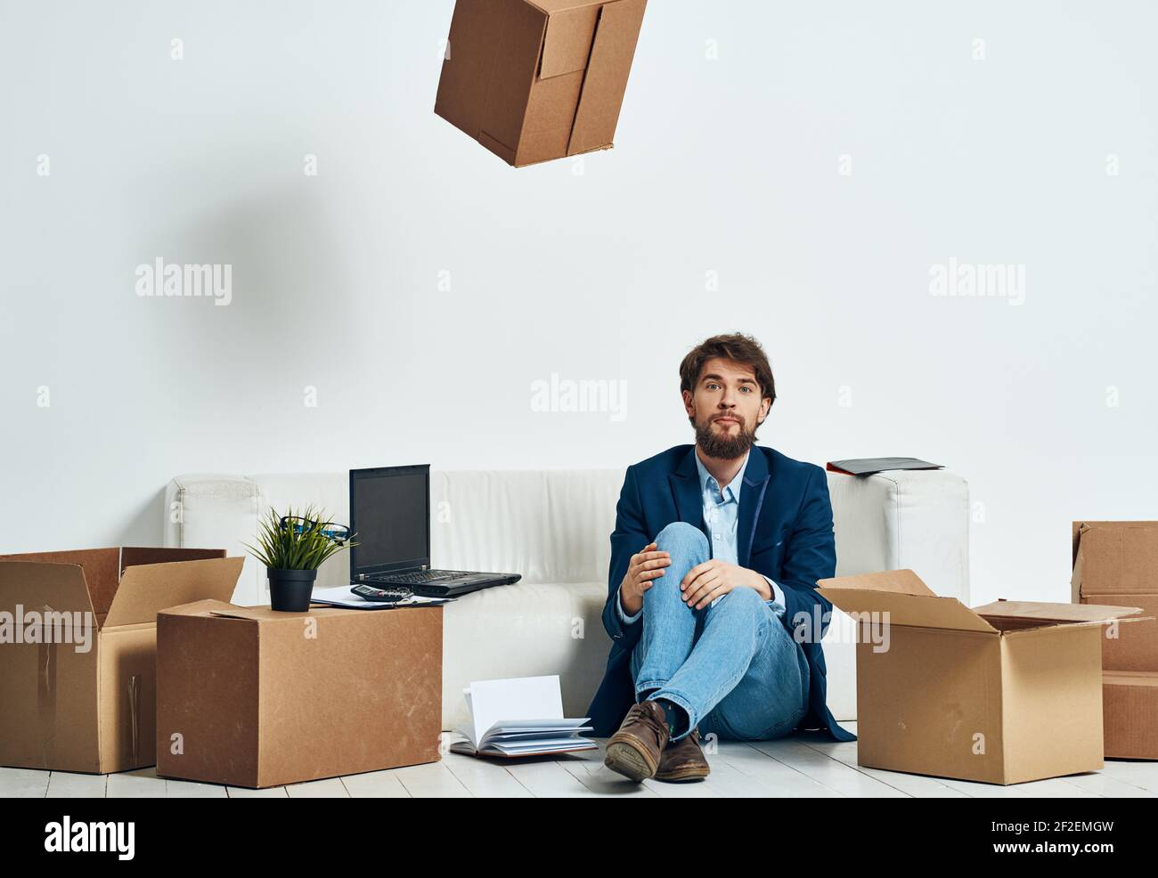 man with boxes packing dismissal job professional Stock Photo - Alamy