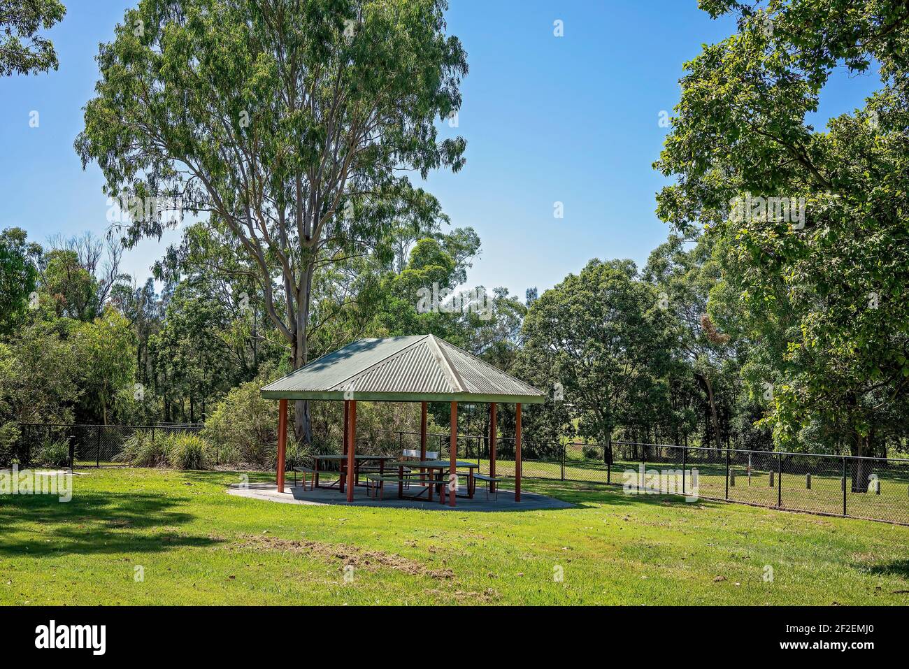 A picnic shade structure with barbecue in a public outdoor park Stock ...