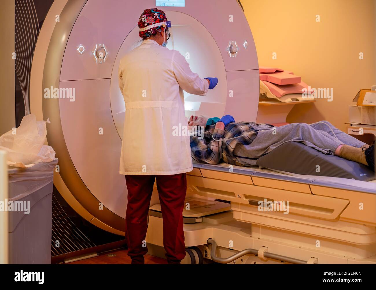 Palo Alto, California - February 21, 2021: Elderly man lying down for ...