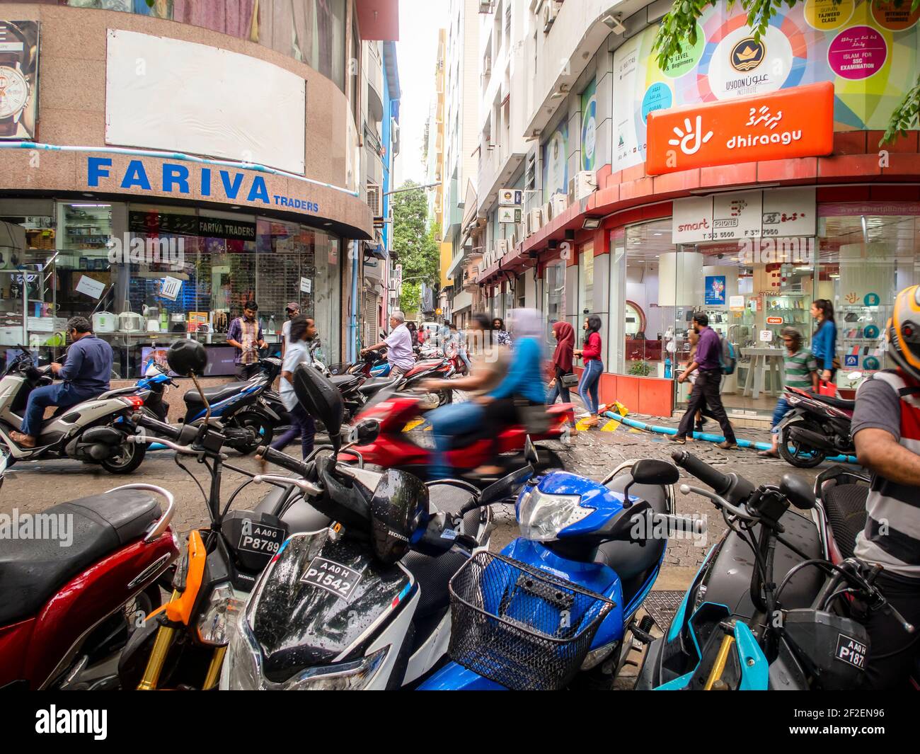 MALE, MALDIVES - NOVEMBER 7, 2019: Street in Male city with fast moving ...