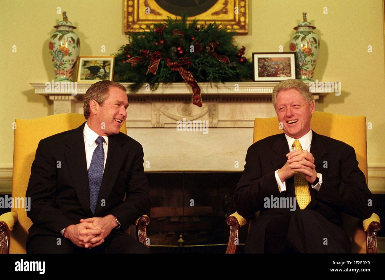 President Bill Clinton and President-Elect George W. Bush hold a ...
