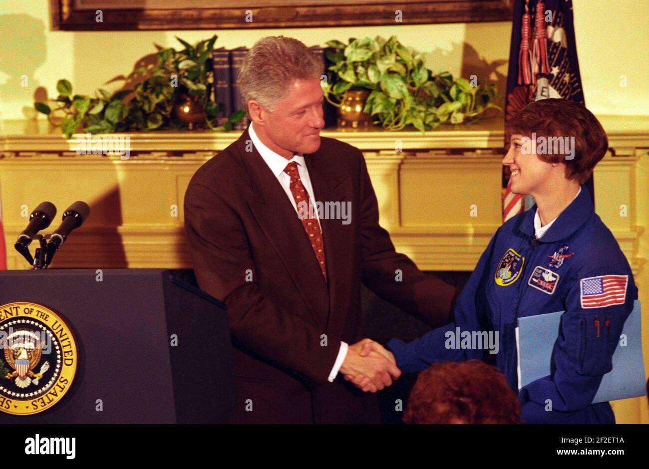 President Bill Clinton shakes hands with Lieutenant Colonel Eileen M ...