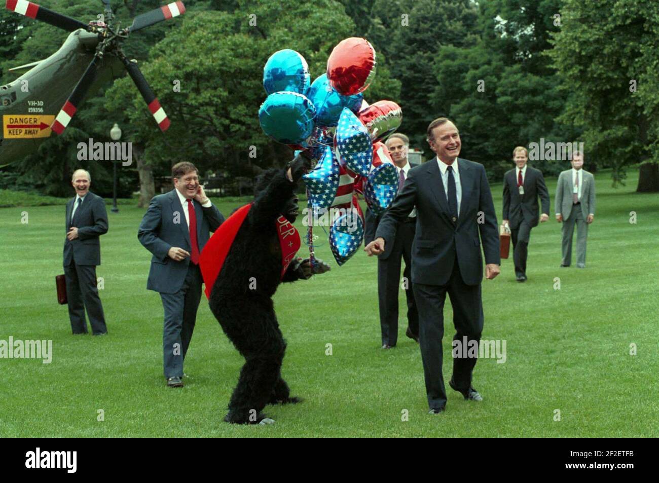 President George H. W. Bush Accosted by a Gorilla Carrying Mylar ...
