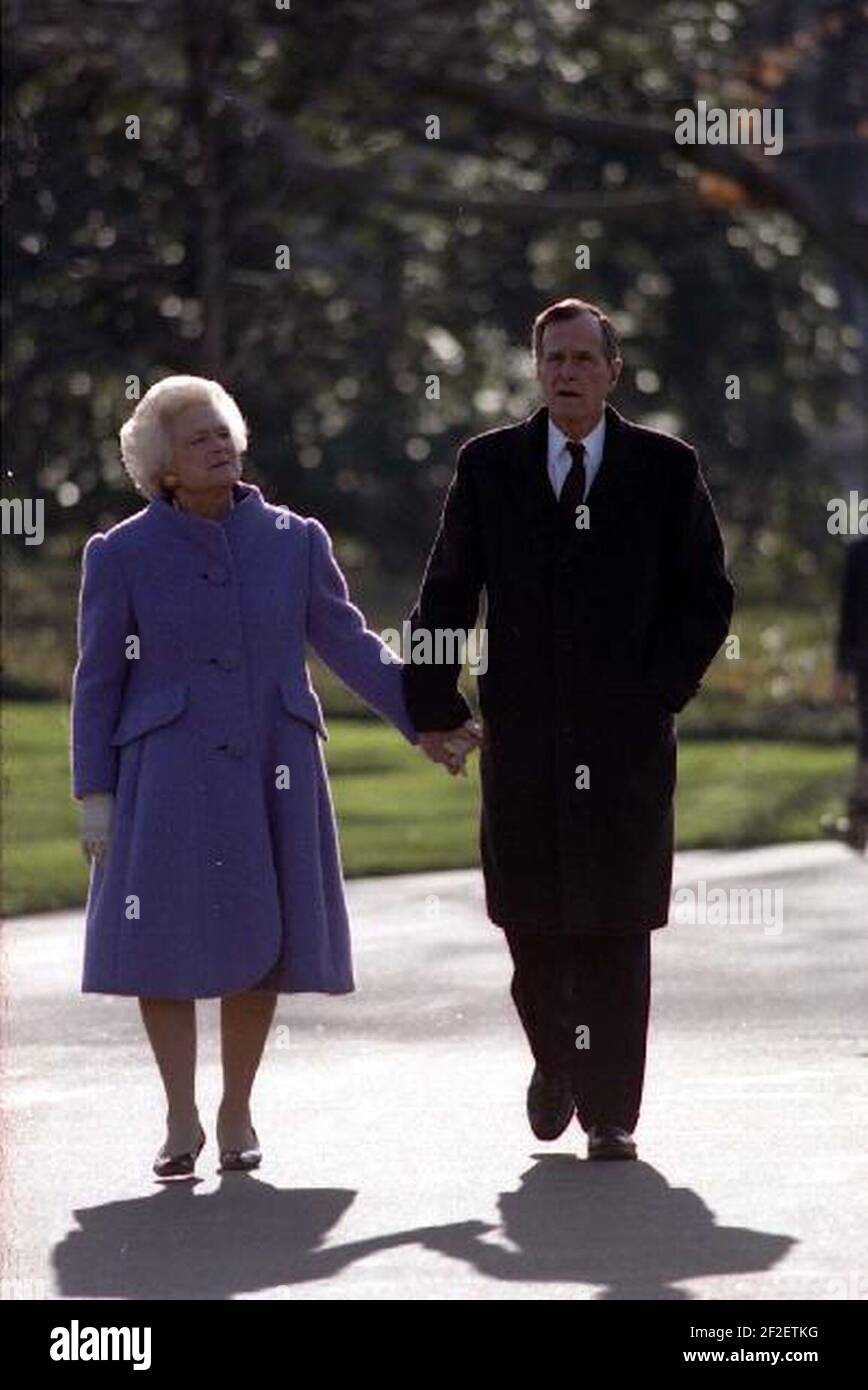 President George H. W. Bush and Mrs. Barbara Bush walk around the south ...