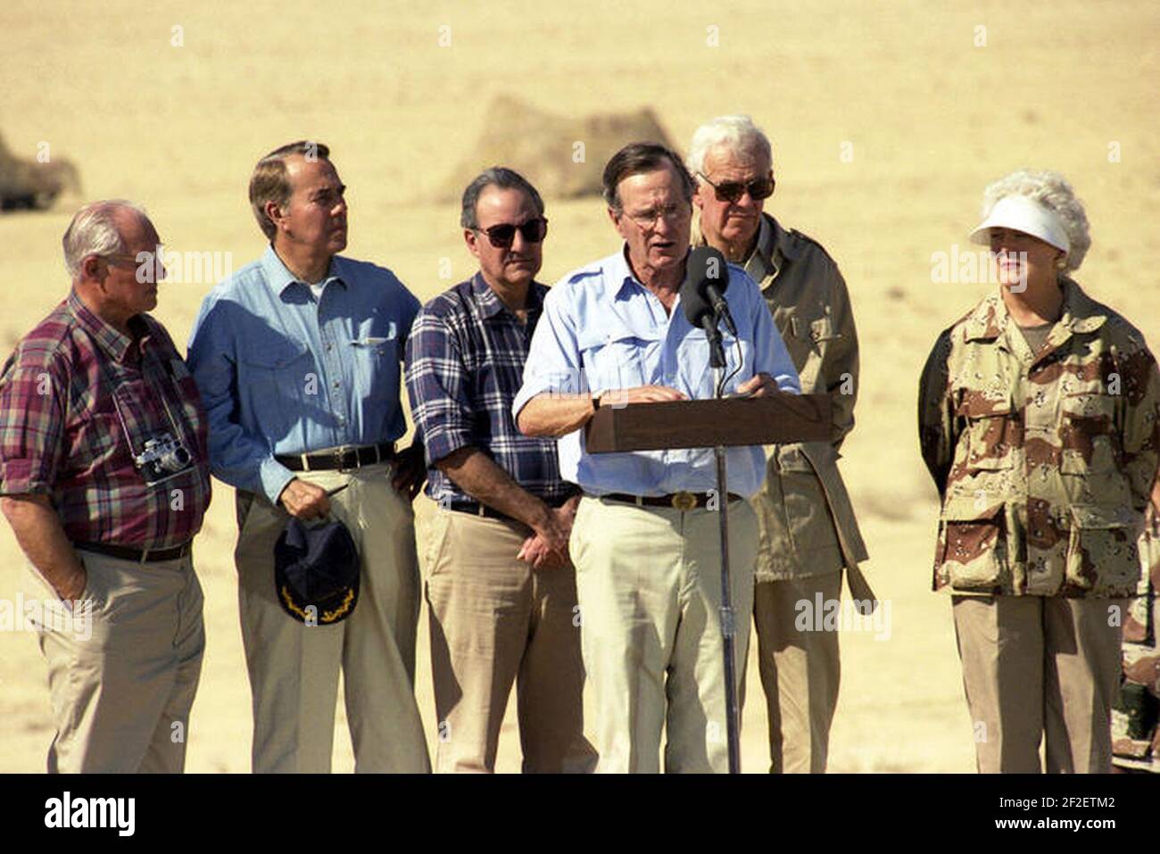 President George H. W. Bush and Mrs. Barbara Bush visit troops from the ...