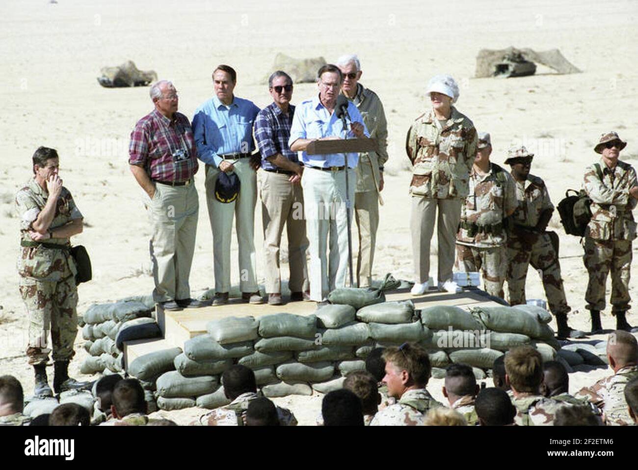 President George H. W. Bush and Mrs. Barbara Bush visit troops from the ...