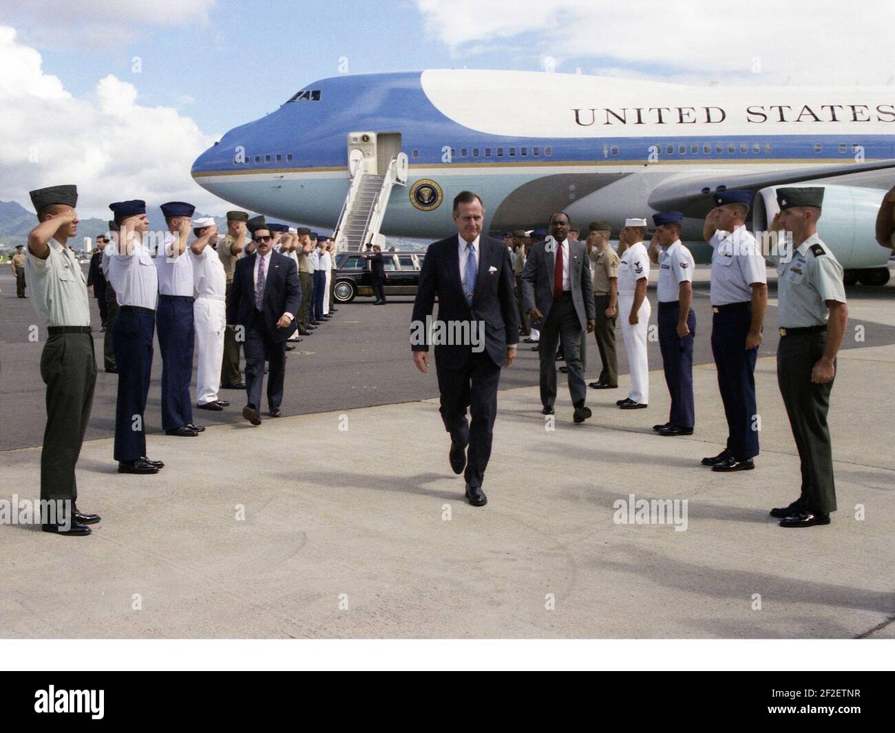 President George H. W. Bush is Welcomed by Military Personnel to Hickam ...