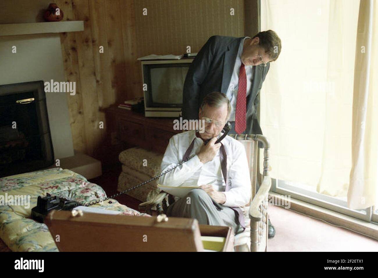 President George H. W. Bush speaks to King Fahd of Saudi Arabia via ...