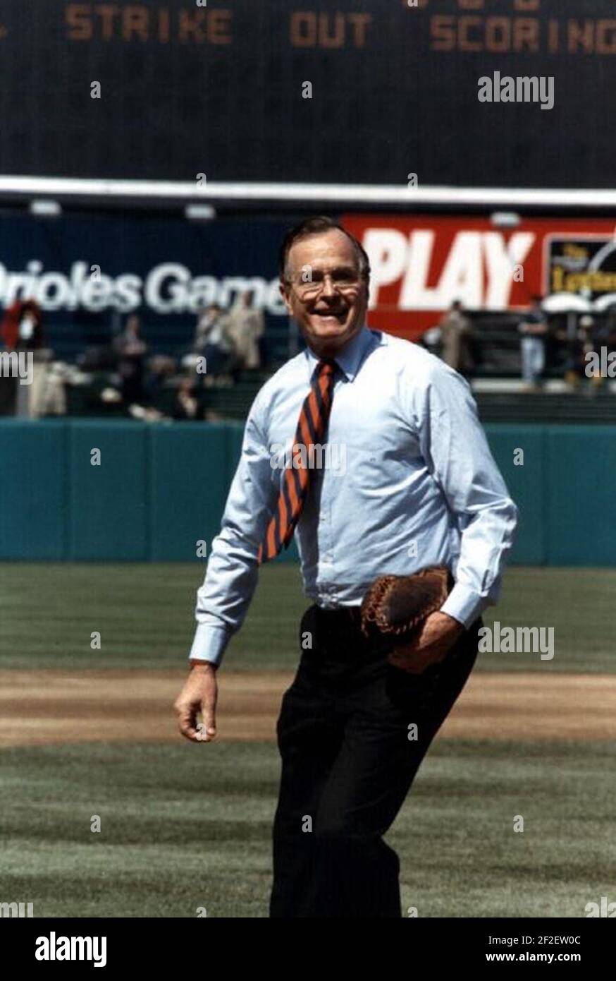 President George H. W. Bush throws the first pitch for the opening day ...
