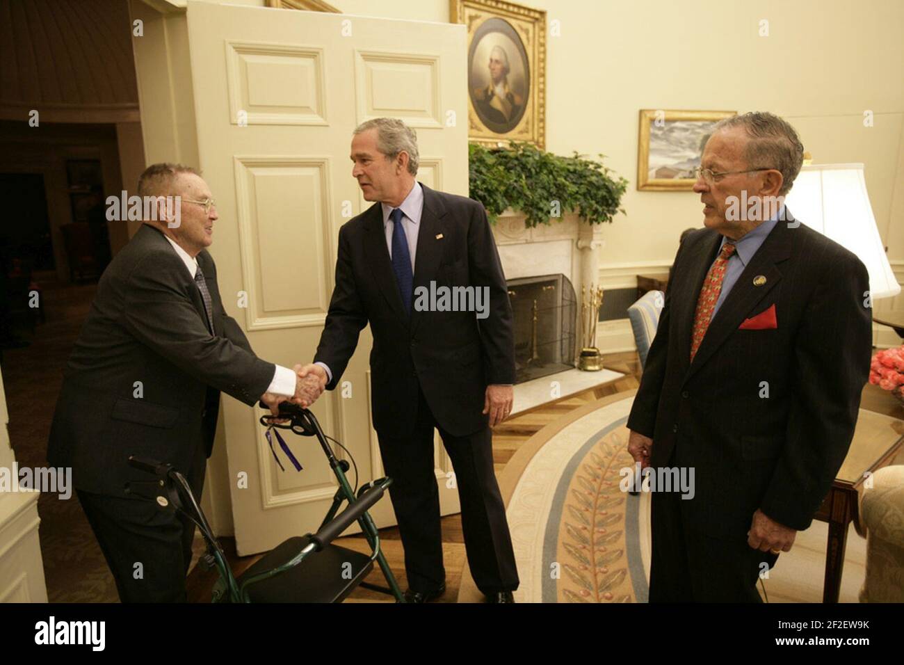 President George W. Bush and Senator Ted Stevens welcome World War II ...