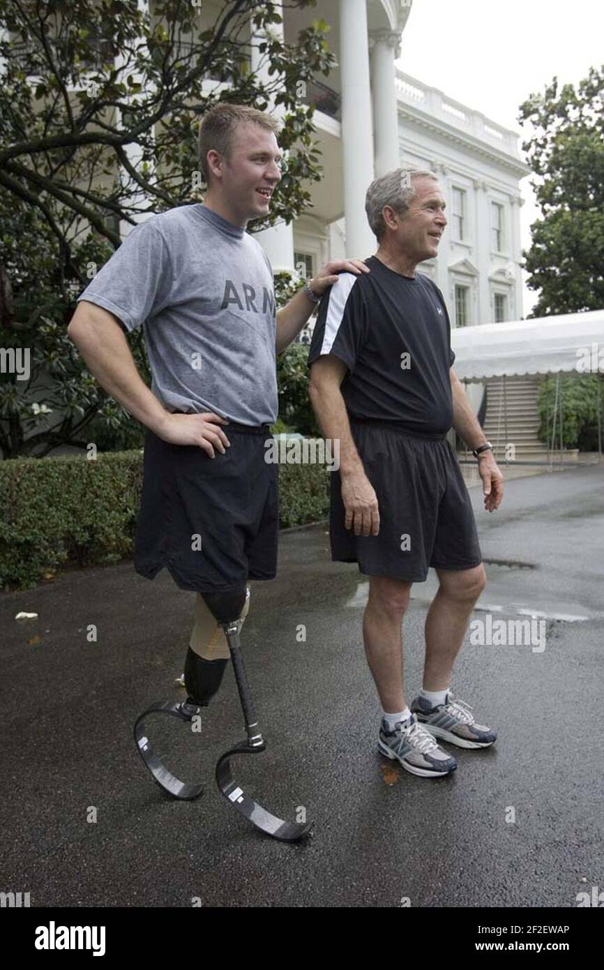 President George W. Bush and U.S. Army Staff Sergeant Christian Bagge ...