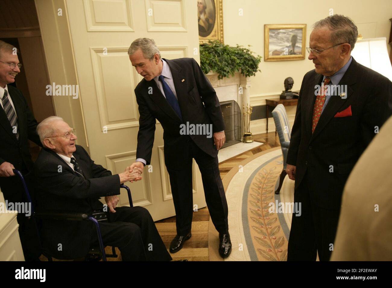 President George W. Bush and Senator Ted Stevens welcome World War II ...