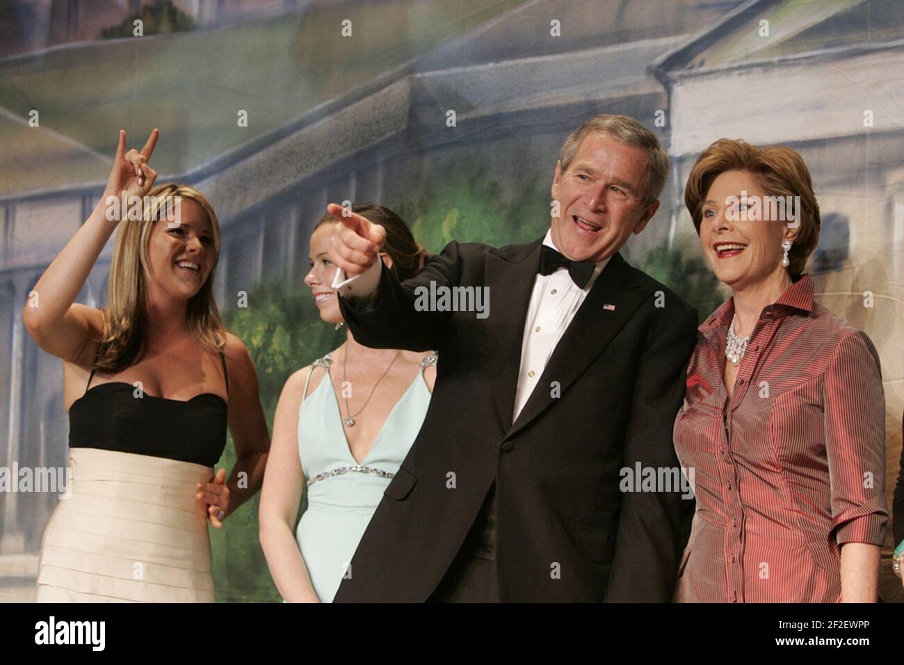 President George W. Bush points out members of the audience at the ...