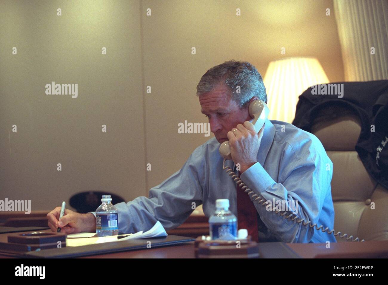 President George W. Bush Talks on the Telephone aboard Air Force One ...