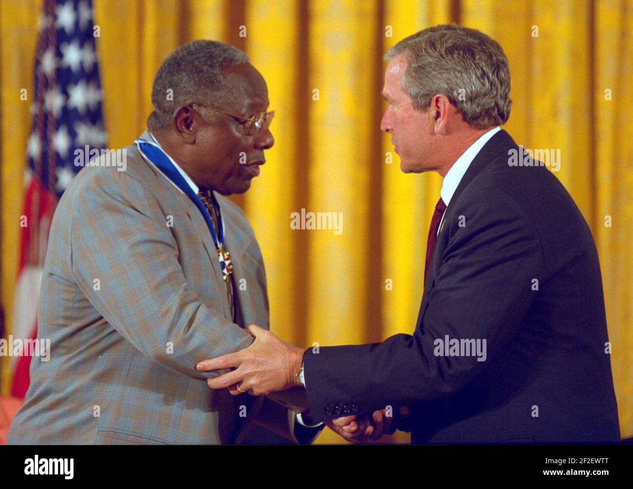 President George W. Bush presents the Presidential Medal of Freedom to ...