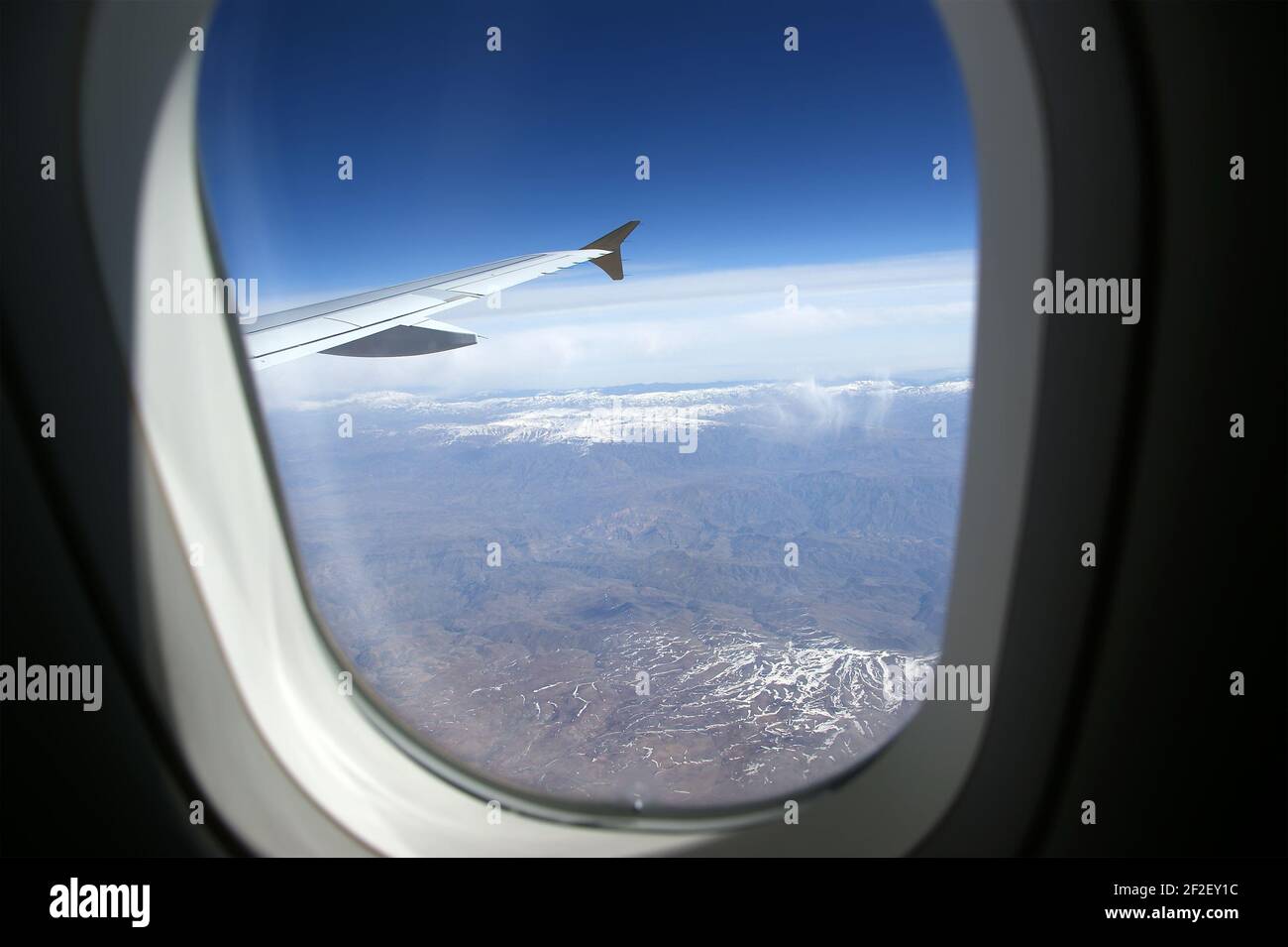 Aircraft illuminator window view Stock Photo - Alamy
