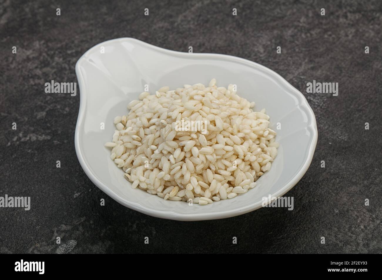 Raw Italian arborio rice for Risotto Stock Photo - Alamy