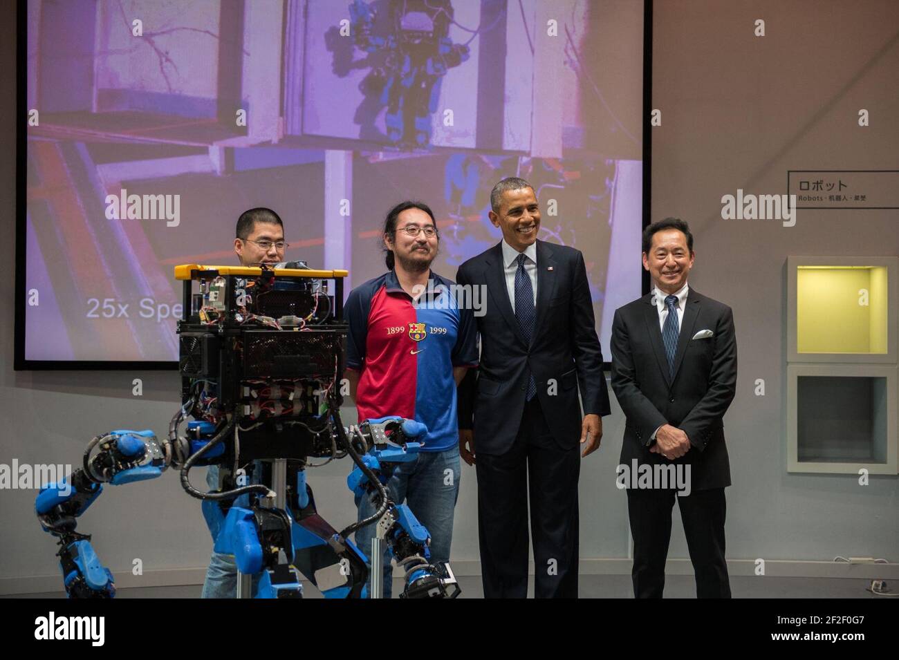 President Obama Poses for a Photo with SCHAFT Robot Designers Stock ...