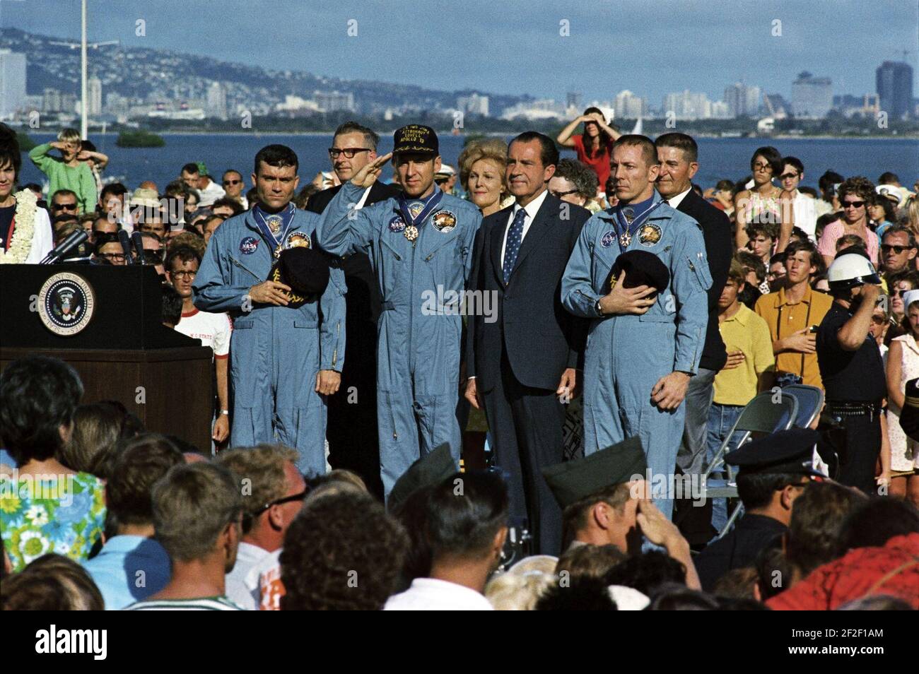 President Richard Nixon and the Apollo 13 astronauts stand at attention ... President Richard Nixon and the Apollo 13 astronauts stand at attention ...
