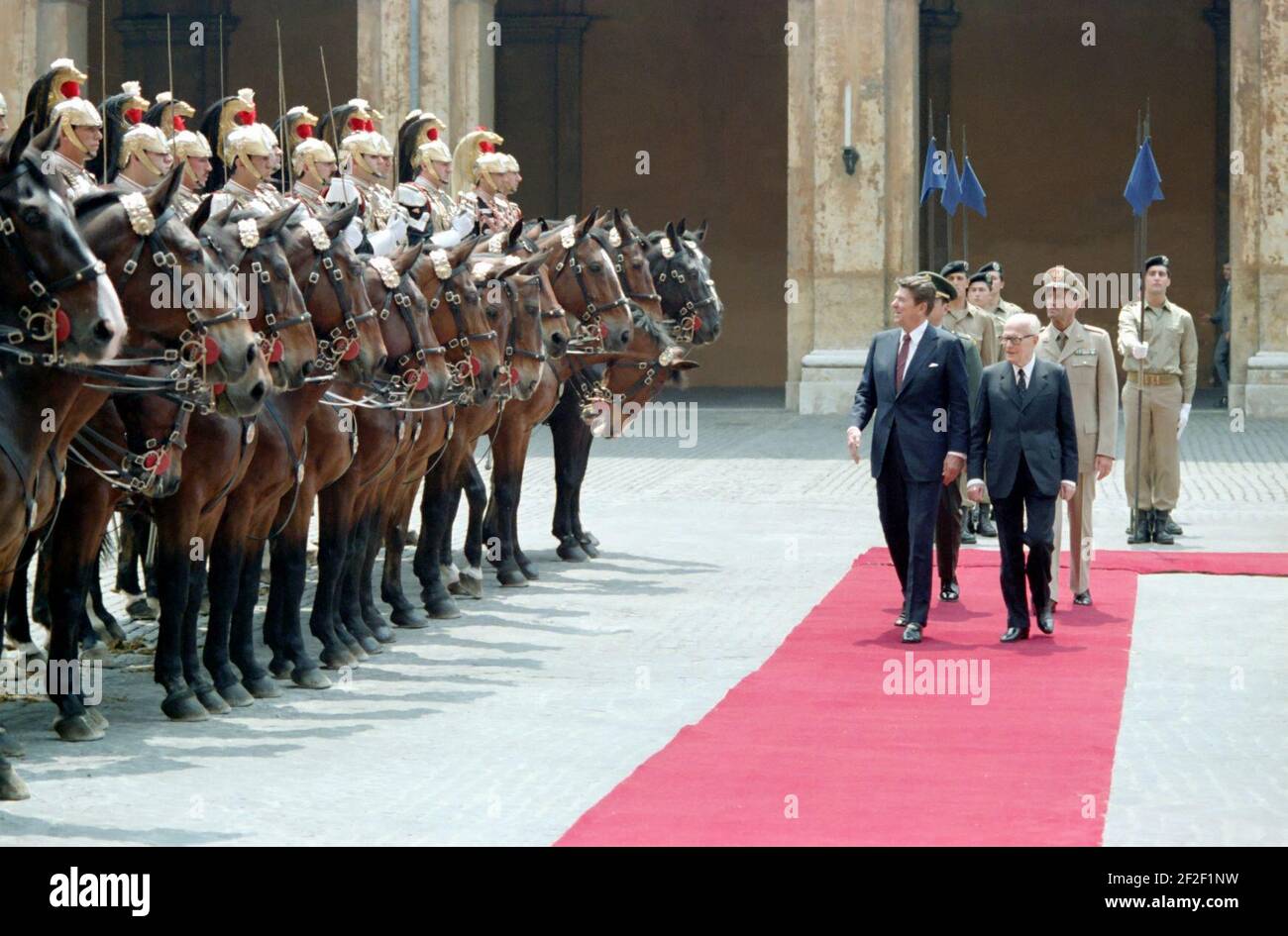 President Ronald Reagan and Alessandro Pertini reviewing troops at ...