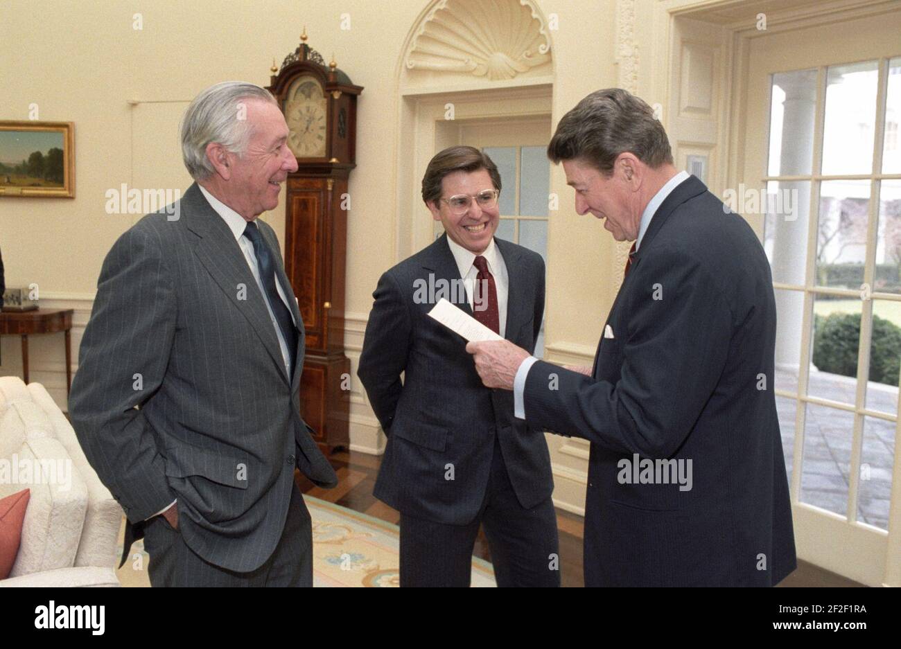 President Ronald Reagan and Don Regan with Peter Wallison Stock Photo ...