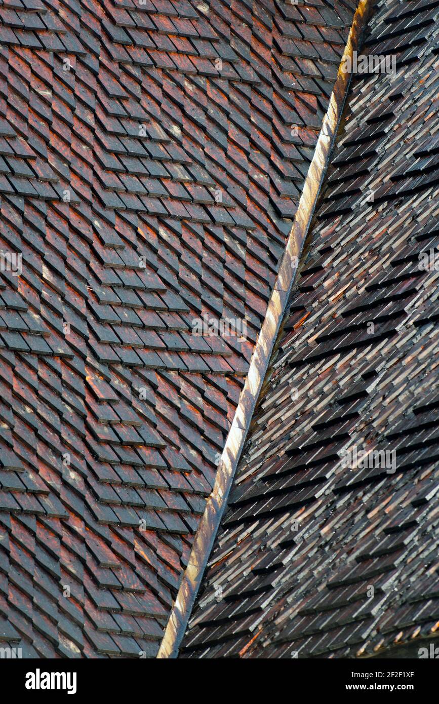 Rectangular wooden roof tiles shingles on old conservation building ...