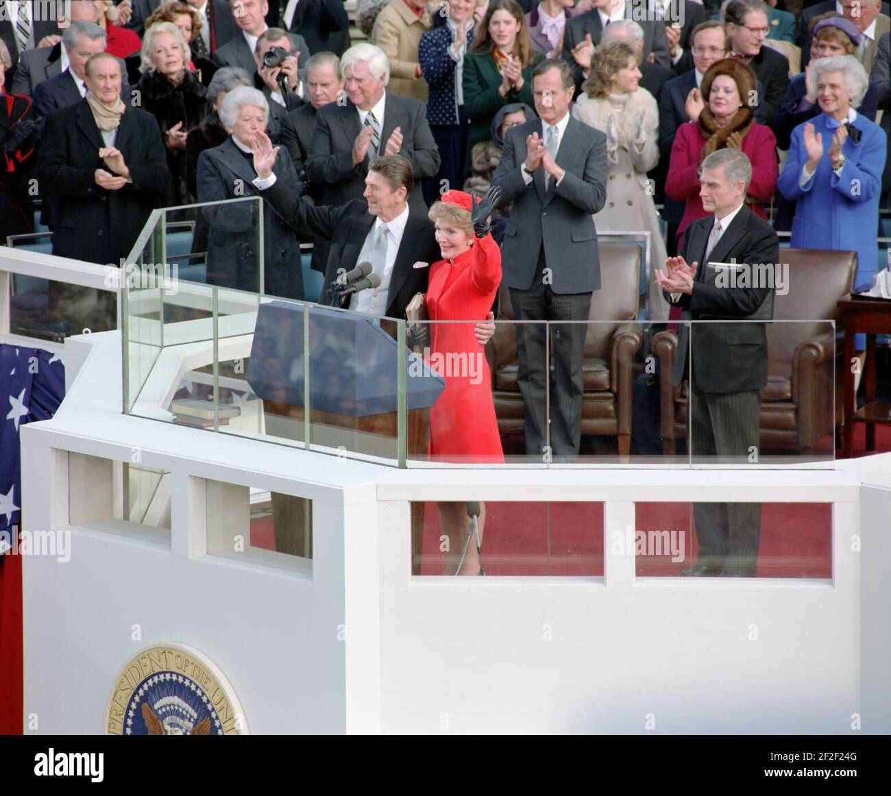 President Ronald Reagan and Nancy Reagan waving after swearing in ...
