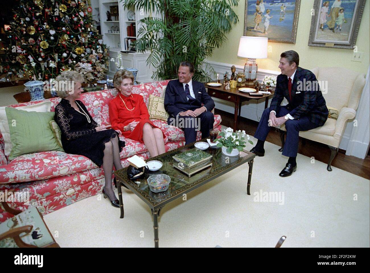 President Ronald Reagan during a dinner with Billy Graham and Mrs ...