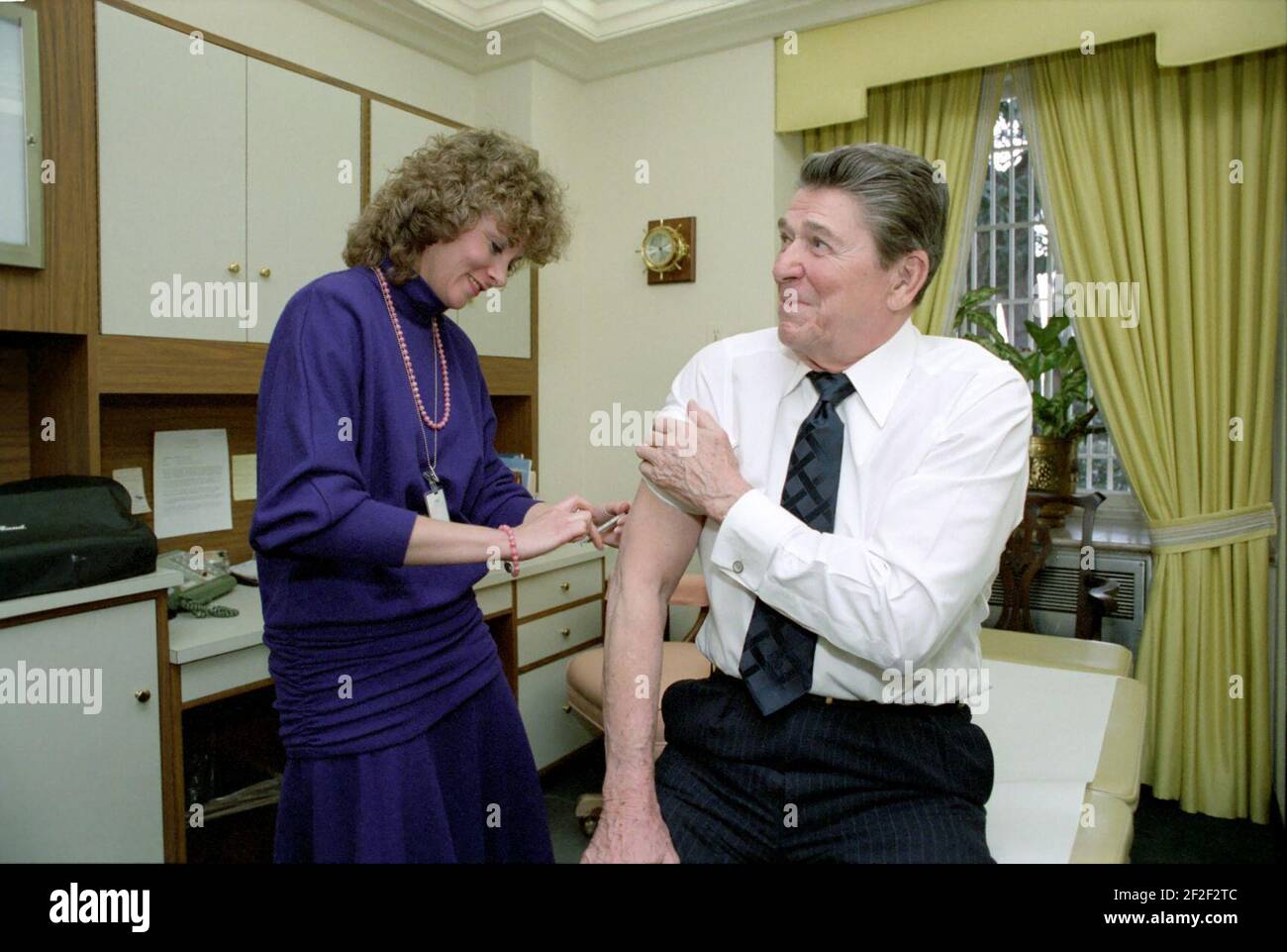 President Ronald Reagan Getting A Shot In White House Doctors Office