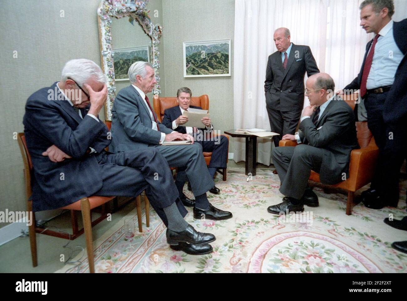 President Ronald Reagan in a staff briefing with Ken Adelman, George ... President Ronald Reagan in a staff briefing with Ken Adelman, George ...