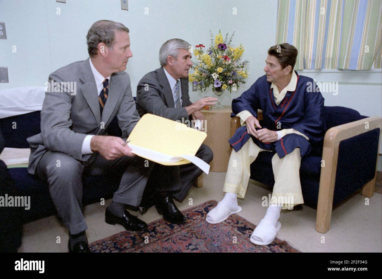 President Ronald Reagan meeting with Senator Paul Laxalt and James ...
