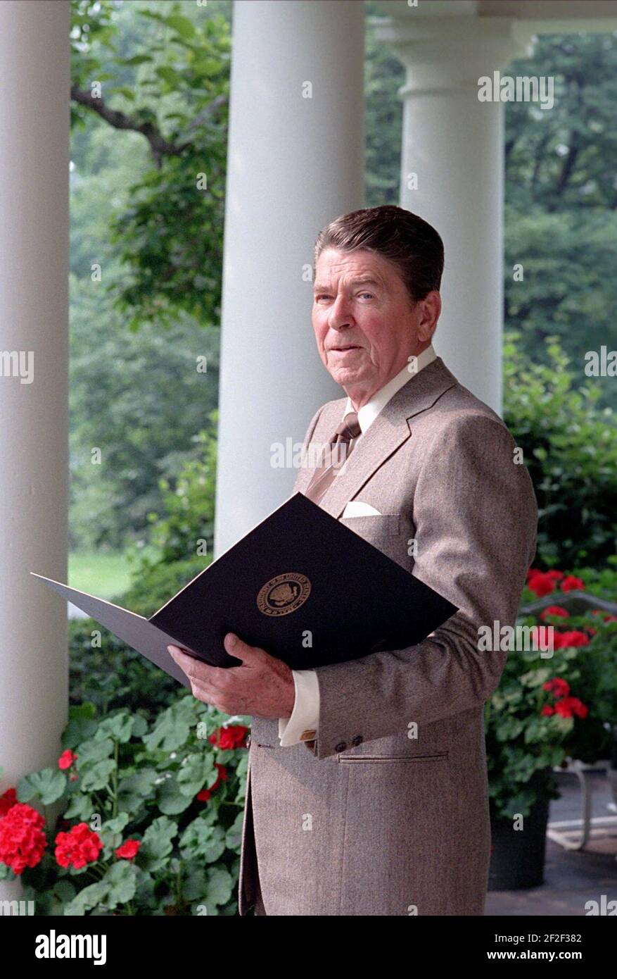 President Ronald Reagan reading on the Colonnade Stock Photo - Alamy