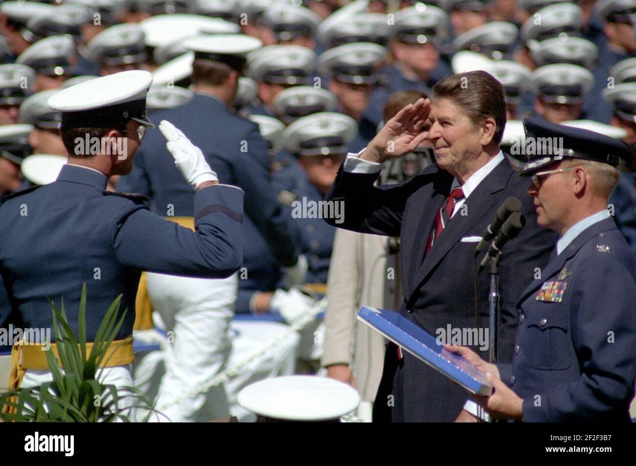 President Ronald Reagan salutes an Air Force Cadet at the United States ...
