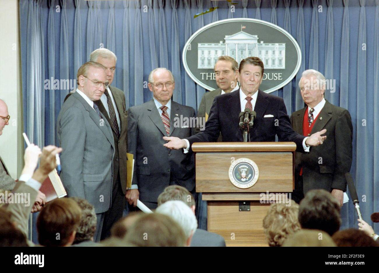 President Ronald Reagan Speaking at The Podium Making An Announcement ...