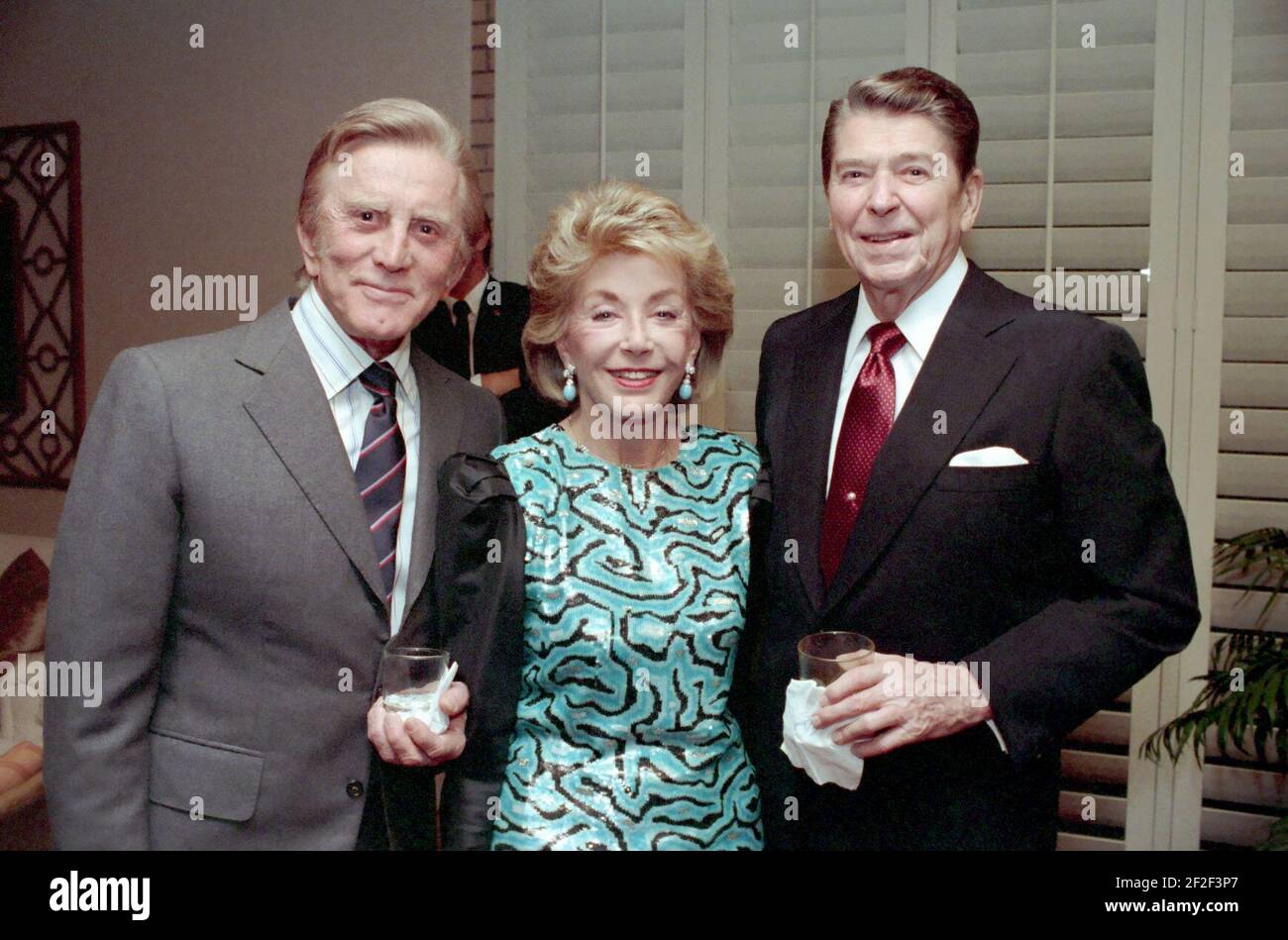 President Ronald Reagan with Kirk Douglas and Mrs. Douglas attending a ...
