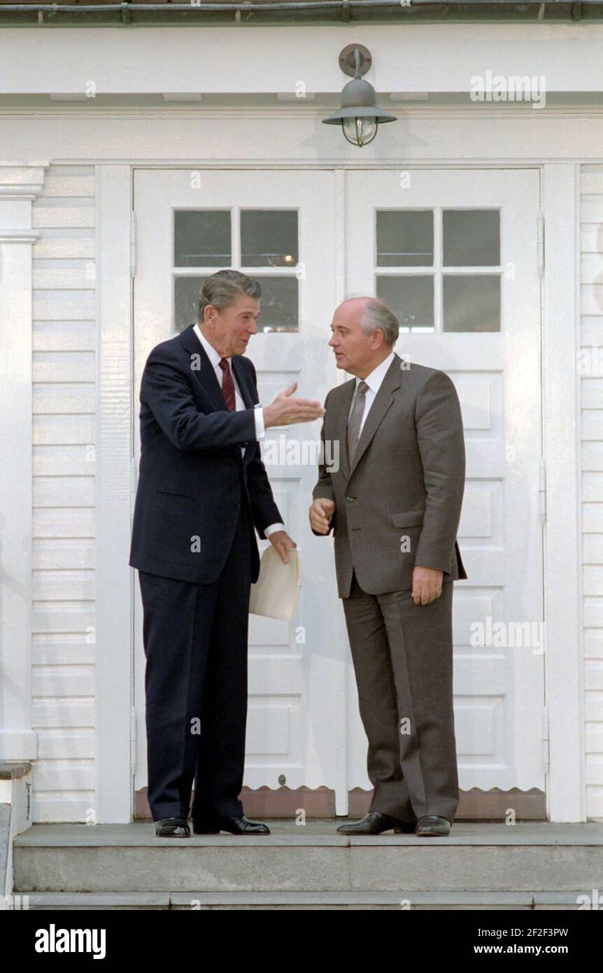 President Ronald Reagan with Mikhail Gorbachev posing for photos on their trip to Iceland Stock ...
