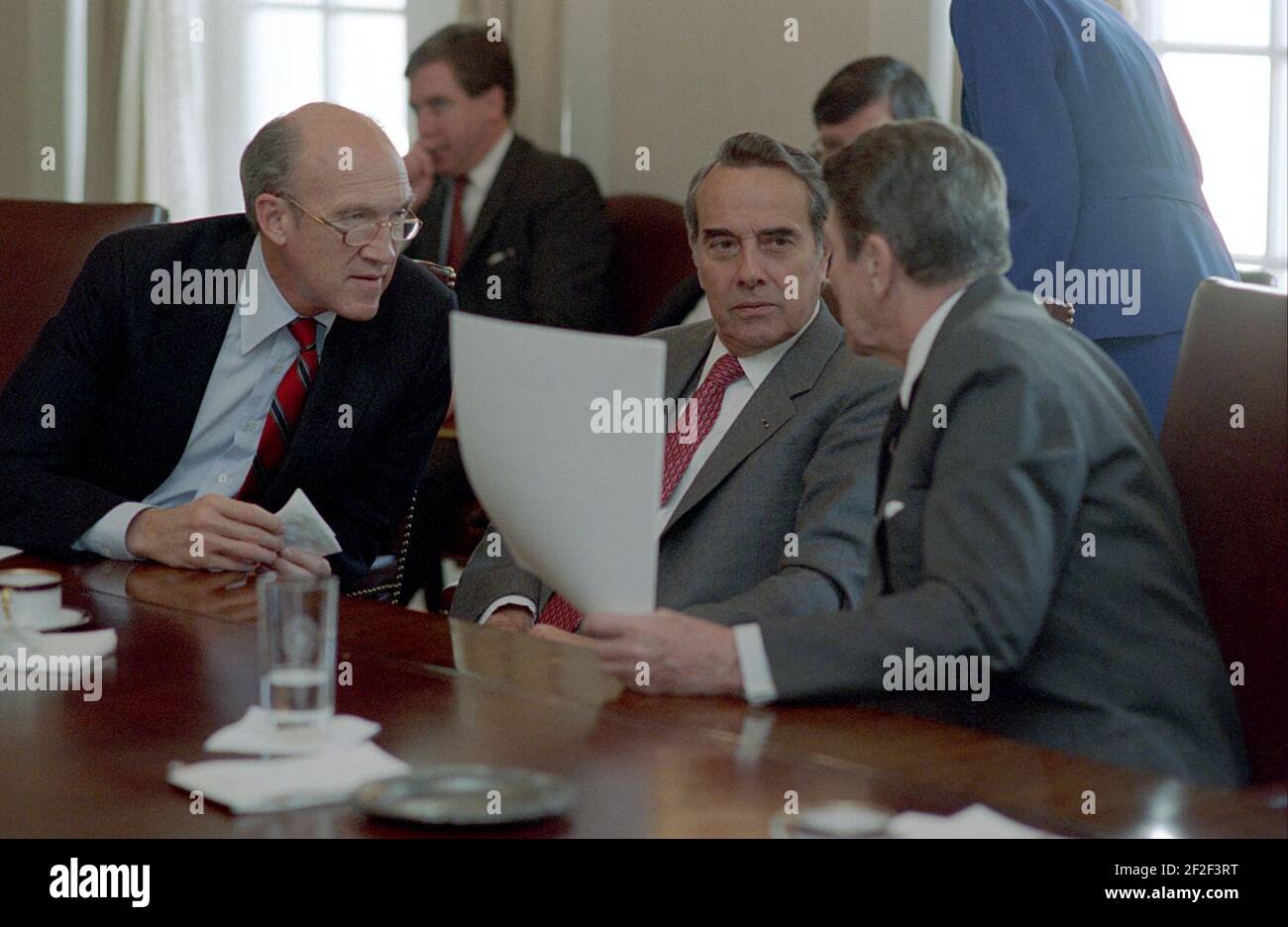 President Ronald Reagan with Robert Dole and Alan Simpson Stock Photo ...