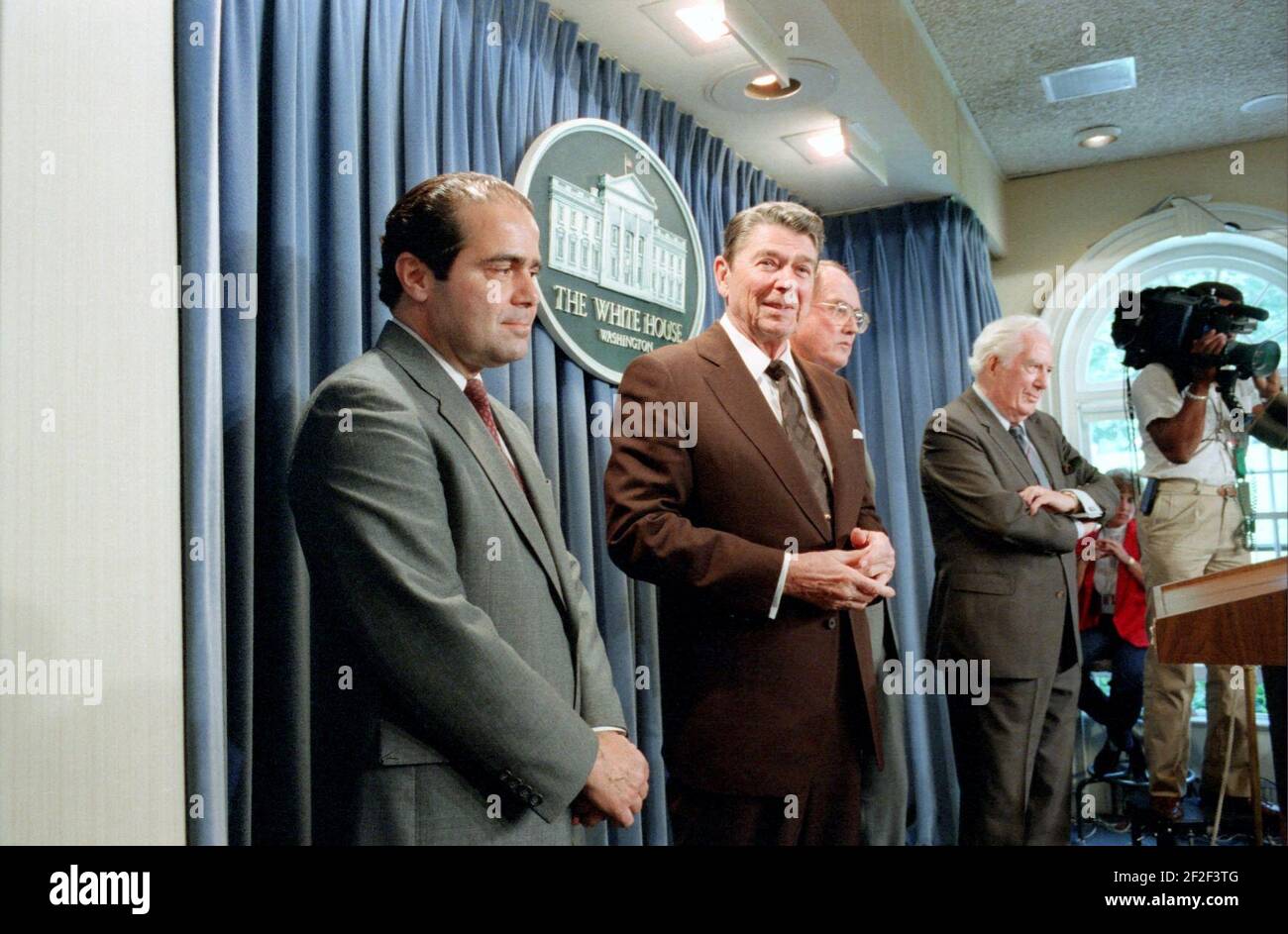 President Ronald Reagan with William Rehnquist, Warren Burger, and ...